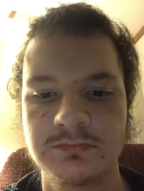 black man face covered in peanut butter looking at the camera om - Imgflip