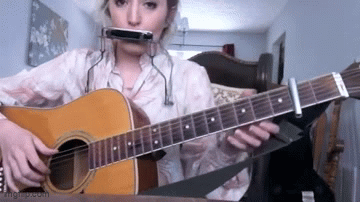 Jackie Stem blowing her harmonica - Imgflip
