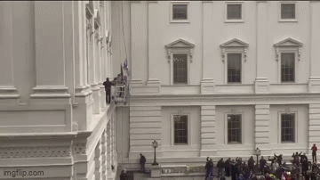 Seditious MAGAt rioters taking down the US Flag at the Capitol to replace it with one of Traitor ...