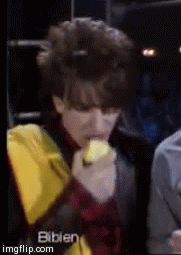 Bono with an apple - Imgflip